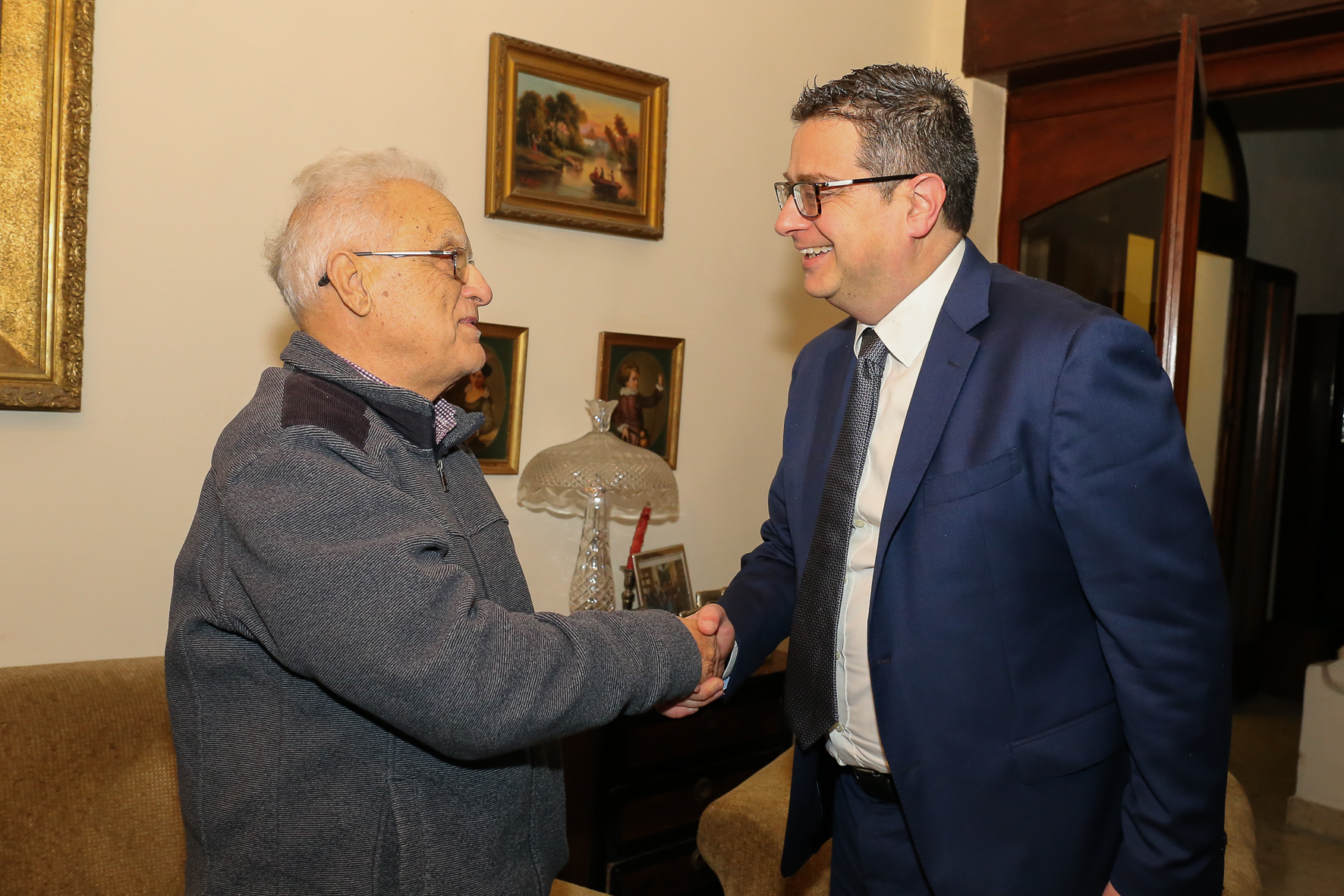 Il-Kap tal-PN Adrian Delia jżur lil Eddie Fenech Adami f'għeluq sninu ...